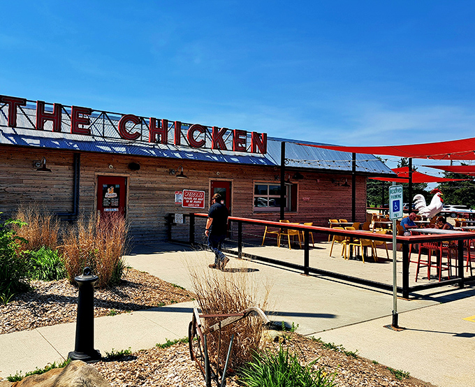 Bold red lettering announces serious chicken intentions at this West Des Moines outdoor dining destination.