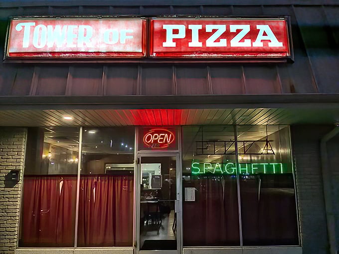 Tower of Pizza's glowing red sign has been a beacon for hungry souls since before pizza was trendy. When neon promises "SPAGHETTI," you know you're home.