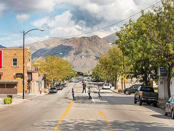 Tremonton's wide main thoroughfare offers breathing room for both cars and thoughts, with mountains standing guard in the distance.
