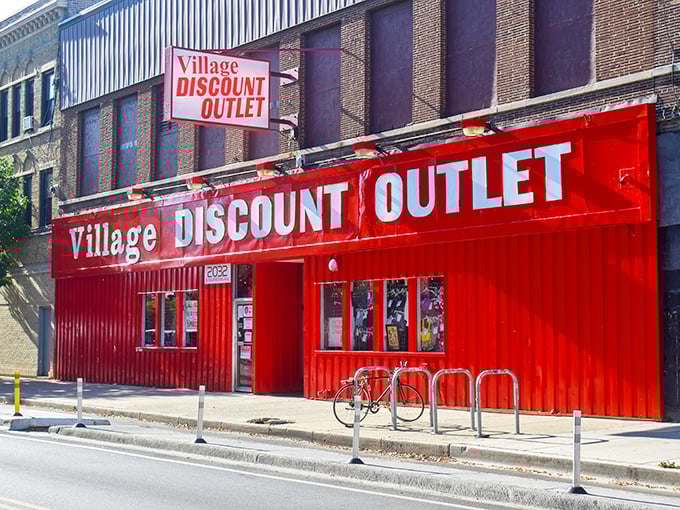 Village Discount Outlet's fire-engine red exterior shouts "bargains inside!" louder than any sale sign ever could.