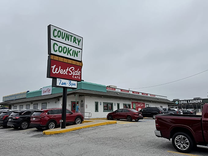West Side Cafe's "Country Cookin'" sign isn't just advertising&mdash;it's a solemn promise of gravy-covered happiness waiting inside.