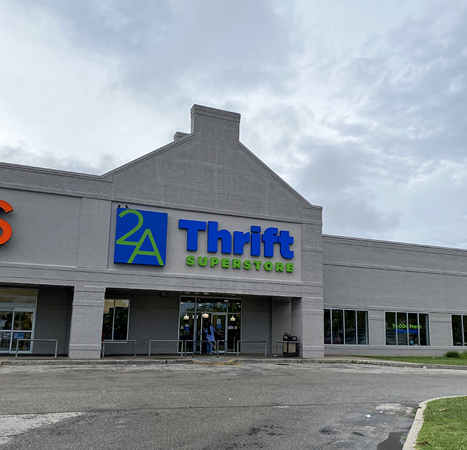 Under moody skies, 2nd Ave Thrift Superstore beckons with the promise of treasures waiting just beyond those doors.