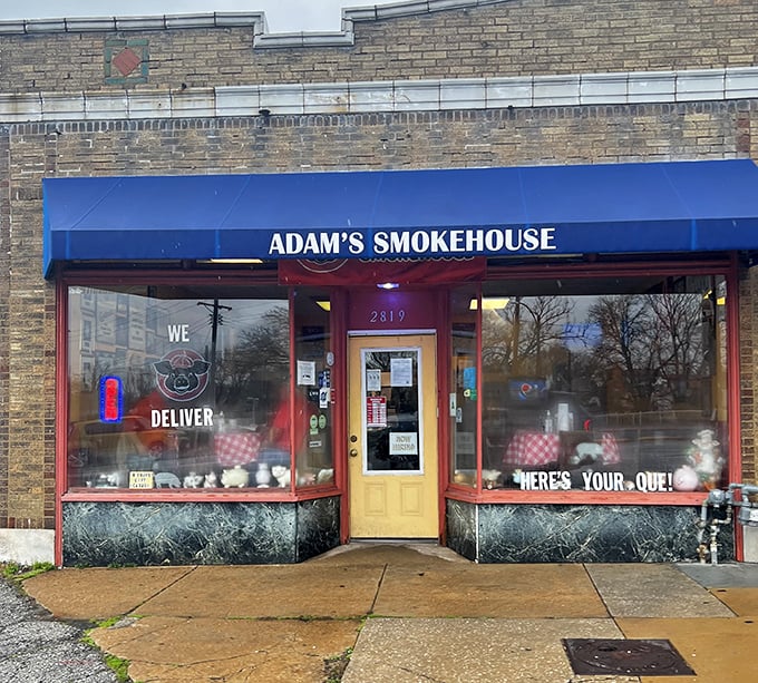 "Where's your 'cue?" asks the window at Adam's. This humble storefront in St. Louis holds smoky secrets worth traveling miles to discover.
