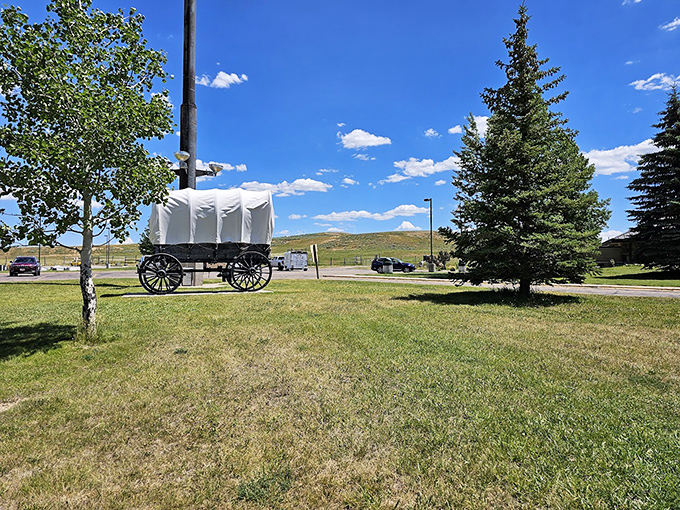 That classic covered wagon reminds you this land has been welcoming travelers for generations of dreamers.