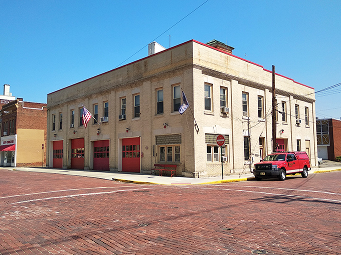 The fire station in Bradford stands ready, brick by sturdy brick. Small-town security never looked so architecturally impressive!