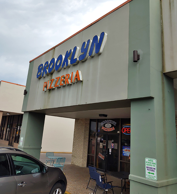 That bold BROOKLYN sign is like the pizza equivalent of a Broadway marquee. The slice must go on!