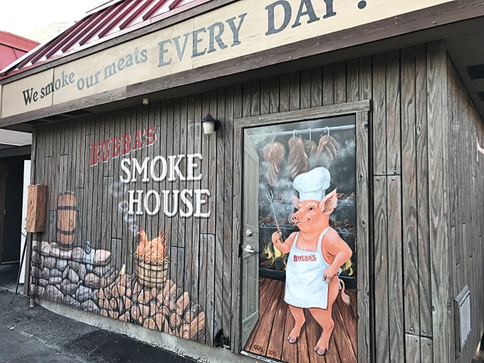 Classic roadside charm meets modern appetite - Bubba's sign practically winks at hungry travelers passing by.