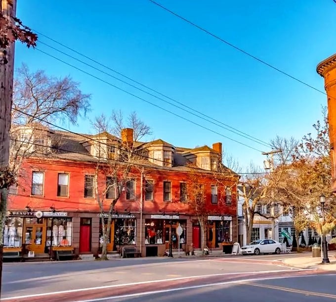 Historic brick buildings with stories to tell – Canterbury's main street hasn't surrendered to chain stores or cookie-cutter development.