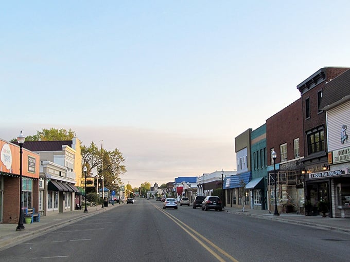 Golden hour bathes downtown Cheboygan in warm light, reminding visitors that beautiful sunsets come free with small-town living.