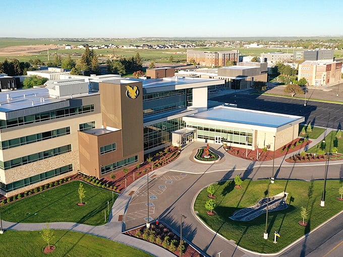 The University of Wyoming campus stands proud against the prairie backdrop, where cowboys and scholars have been mingling for generations.