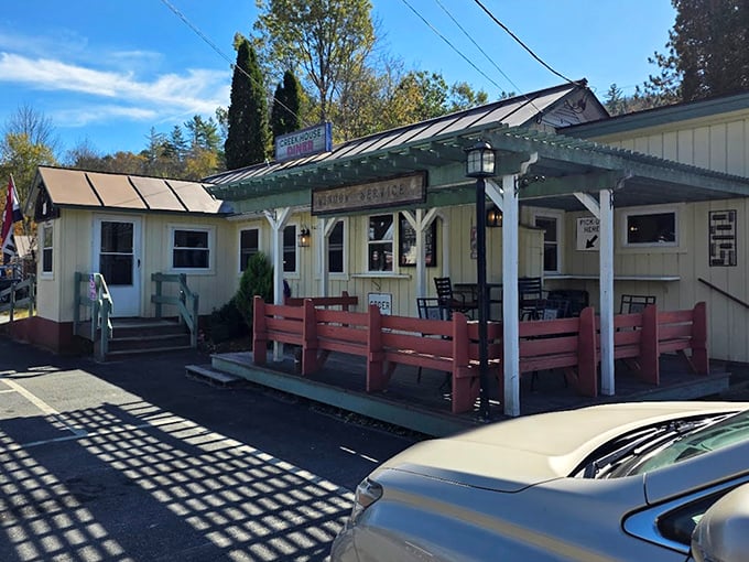 That covered porch isn't just charming &ndash; it's where locals linger over coffee while plotting their next Vermont adventure.