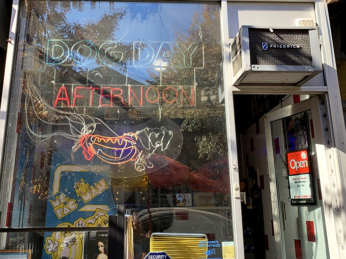 That glowing hot dog sign is basically Batman's signal for hungry people. Your taste buds' adventure begins here!