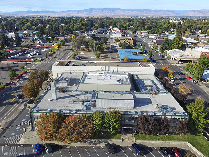 The aerial view transforms this frontier-era beauty into something worthy of a Hollywood western set.