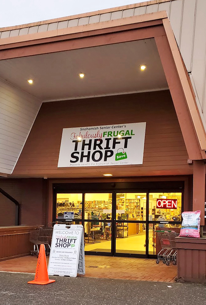 The welcoming entrance to Snohomish Senior Center's Fabulously Frugal shop beckons with warm lighting and the promise of discoveries. Step in and step back in time.
