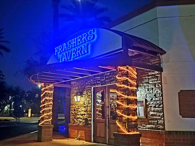 Frashers Tavern's stone entrance glows with warm light. Like finding a secret speakeasy that happens to serve perfect steaks.