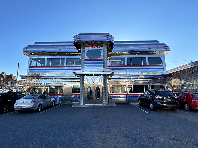 Double-decker diner dreams! Goobers' reflective exterior promises (and delivers) twice the breakfast brilliance inside those shiny walls.