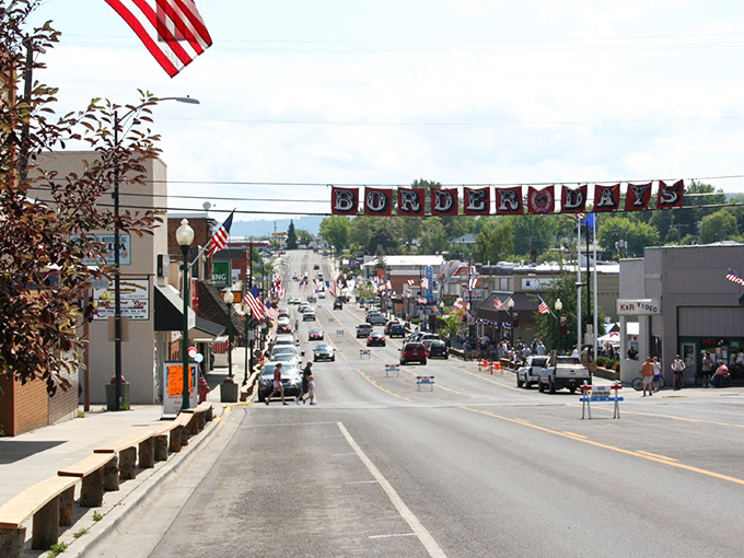 "Border Days" banners stretch across Grangeville's main street, promising small-town festivities where fun doesn't require a second mortgage. Mountains frame this affordable paradise.