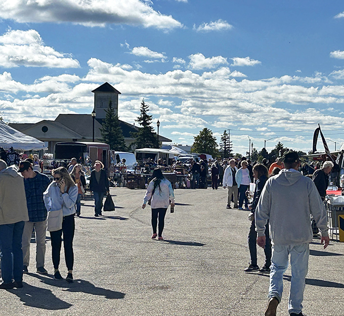 Crowds navigate the outdoor vendor maze at Grayslake. The thrill of the hunt brings everyone together on perfect Illinois days.