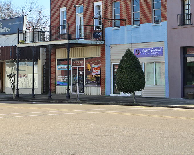 Small-town charm meets modern convenience in Grenada, where every storefront tells a story of community pride.