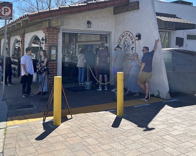 Where strangers become friends united by a common purpose: getting their hands on some of the best smoked meat this side of Texas.