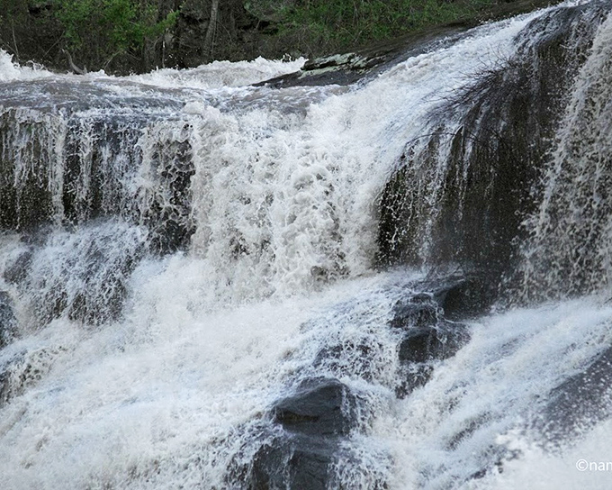 Historic dam structure at High Falls State Park. Once powering local industry, now it's a peaceful spot for reflection.