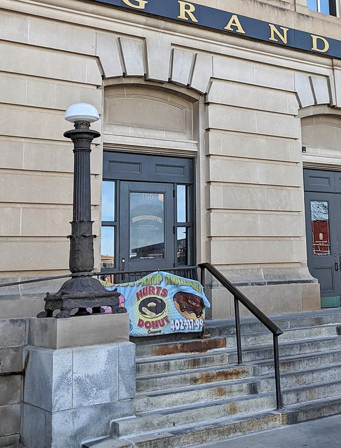 That brick entrance leads to donut wonderland - where creativity meets sugar in beautiful chaos. 