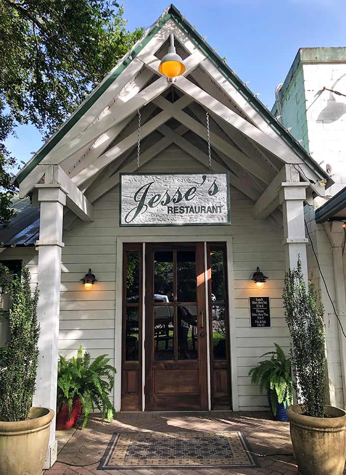 Elegant yet approachable&mdash;Jesse's Restaurant's entrance with its potted ferns says "y'all come in" with style.