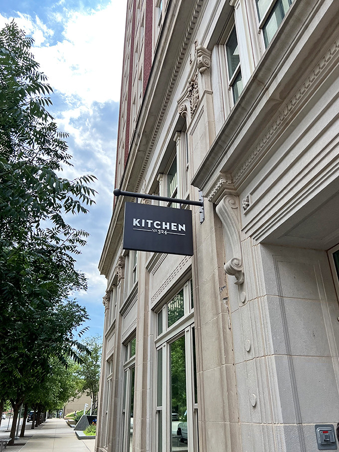 That simple black sign marks the spot where breakfast becomes an art form without the gallery price tag.