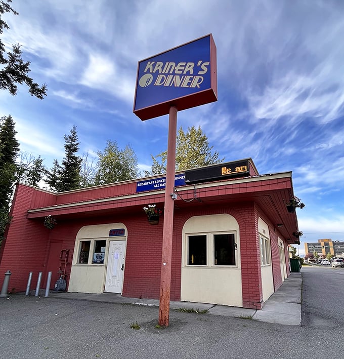Morning sunshine makes this little red diner glow like a breakfast beacon. The sign might be simple, but the food inside is anything but.