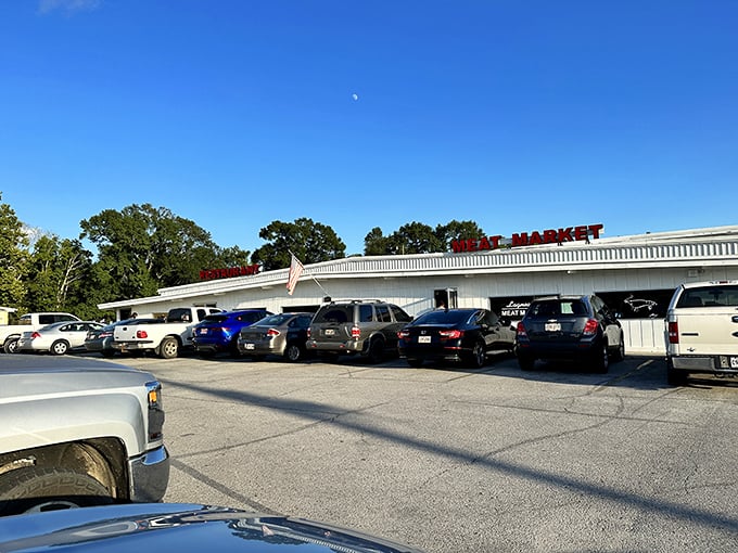 The packed parking lot at Lagneaux's tells you everything you need to know about what's waiting inside.