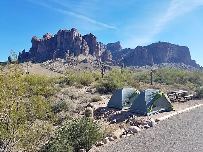 Camping beneath the watchful gaze of the Superstitions &ndash; better than any five-star hotel's wallpaper.