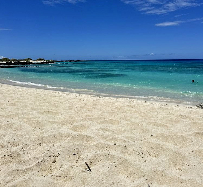 The gentle curve of Makalawena Beach creates a perfect swimming cove. That water color isn't Photoshopped&mdash;it's just Hawaii doing what Hawaii does best.