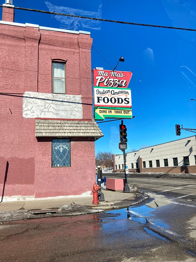 Evening at Maverick's&mdash;where the red umbrellas invite you to enjoy pizza perfection under the open sky.