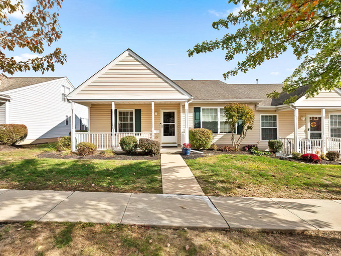 This Manatawny Village home features a welcoming front garden and attached garage. No more winter windshield scraping—now that's what I call retirement planning!