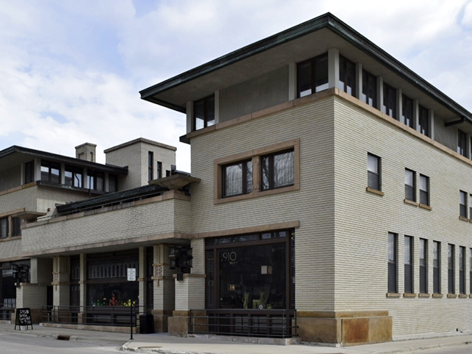 The brick-lined streets of Mason City offer affordable shopping and dining options in a picturesque setting.