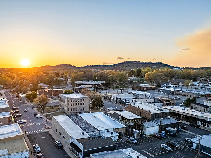 Sunset bathes Mountain Home in golden light, transforming an ordinary town view into a postcard-worthy moment of Ozark Mountain magic.