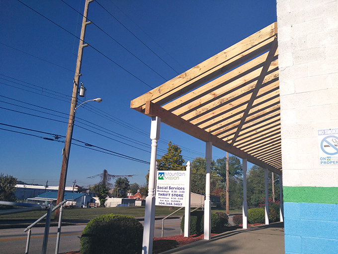 The welcoming wooden overhang at Mountain Mission invites you into a world of secondhand surprises.