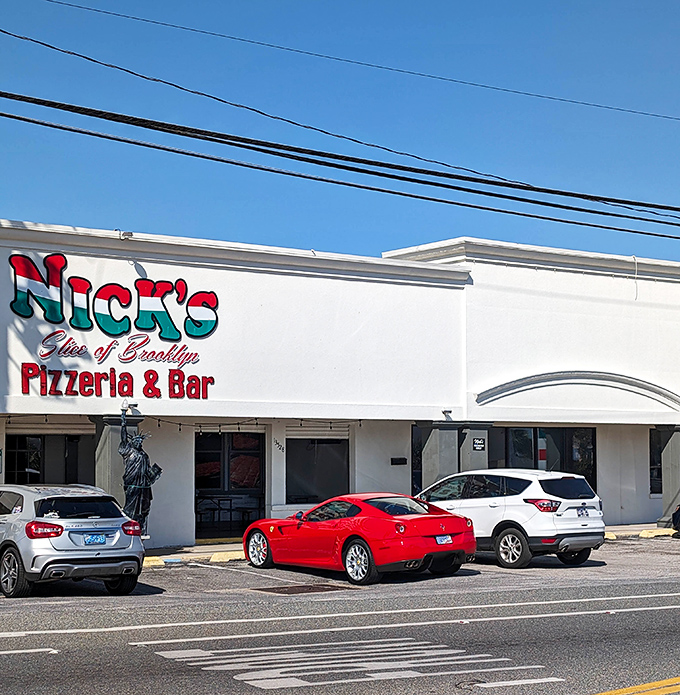 The red, white, and green sign at Nick's isn't subtle about its NYC roots. This slice of Brooklyn belongs on your Florida bucket list.