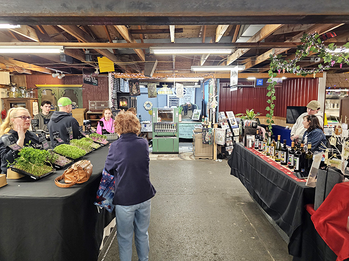 Indoor vendors create a cozy marketplace atmosphere where microgreens and vintage bottles share space in this collector's paradise.