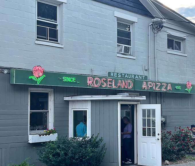 Those roses on Roseland's sign aren't just decoration&mdash;they're a promise of pizza that blooms with flavor. The modest building hides extraordinary culinary magic.
