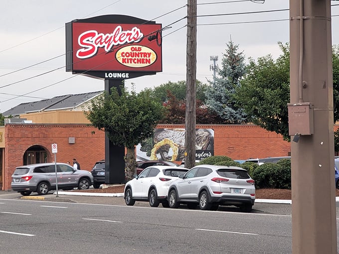 Checkered tablecloths and wood paneling create the perfect backdrop for serious comfort food conversations and laughter.