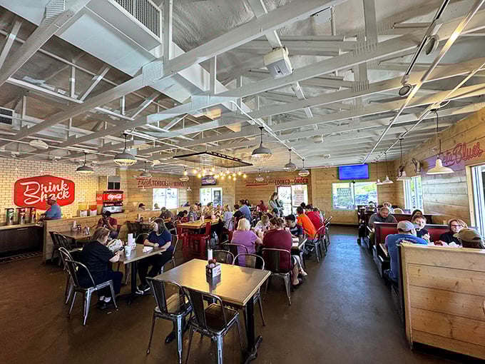 The bustling interior of Slim Chickens&mdash;where strangers become friends united by the universal language of perfectly fried poultry.