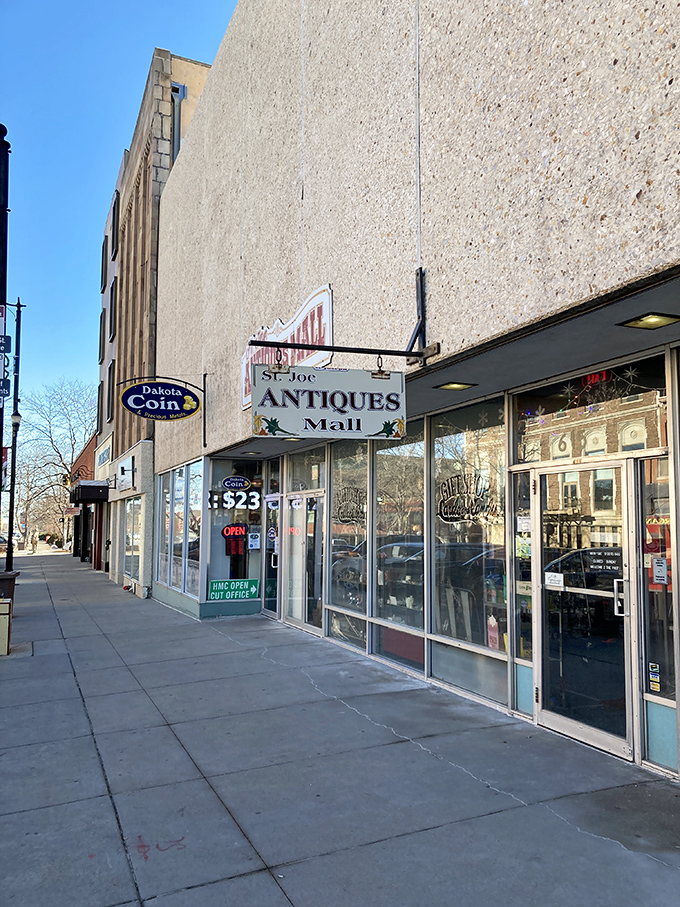 Glass windows gleaming with treasures from another era. If these objects could talk, they'd probably tell you to stop taking selfies and buy something already.