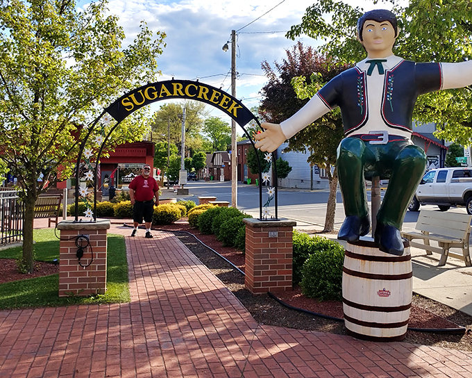 "Little Switzerland" announces itself with open arms. Sugarcreek's iconic entrance and wooden Swiss boy statue greet curious travelers.