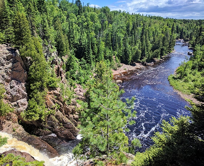 The mighty waters of Lake Superior stretch to the horizon, reminding us we're just tiny specks in nature's grand design.