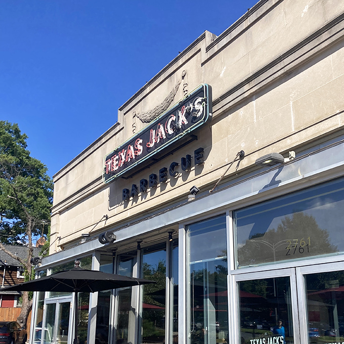 Floor-to-ceiling windows reveal the serious business of smoking meats in this contemporary barbecue temple
