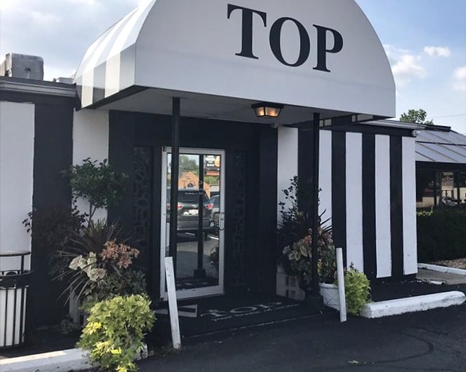 Black and white stripes announce this Columbus classic. The Top has been perfecting the art of steak since your grandparents' date nights.