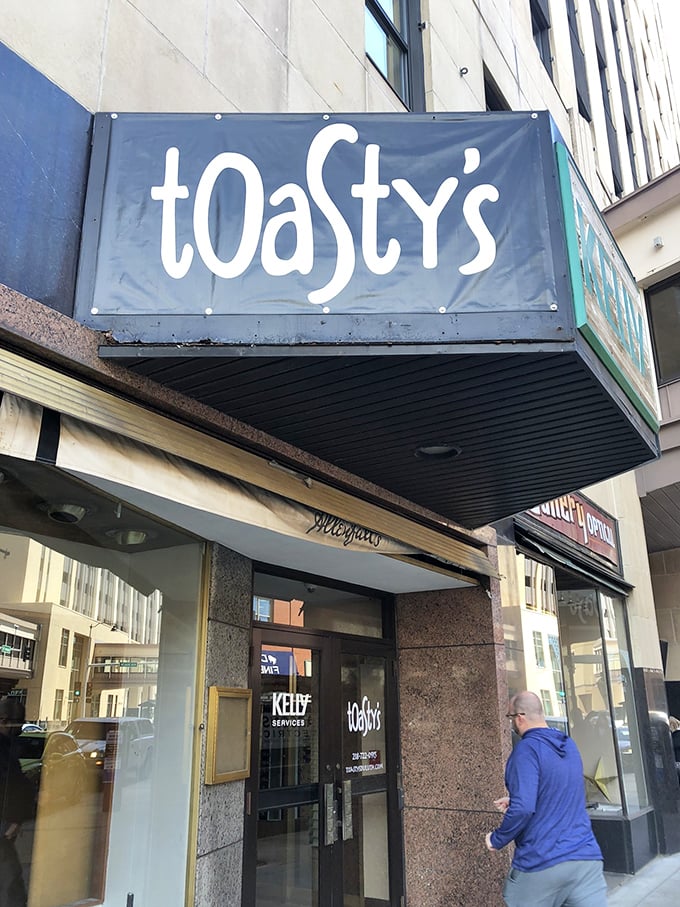 Toasty's bold sign beckons hungry Duluth wanderers &ndash; a sandwich sanctuary amid the brick and concrete of downtown.