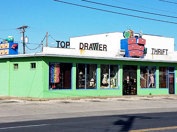 The mint-green exterior and playful rooftop dresser announce: "Normal thrift shopping stops here. Welcome to Austin weird!"