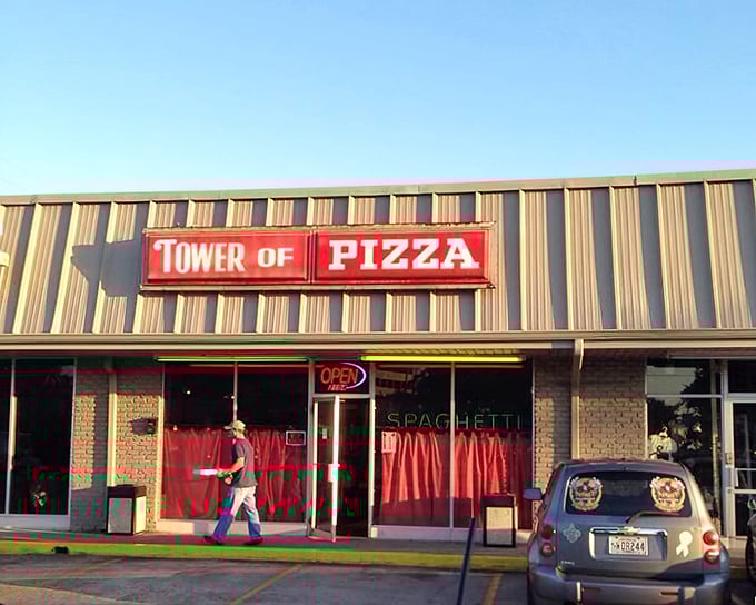 Red curtains and classic signage &ndash; Tower of Pizza is a time machine disguised as a restaurant. The 70s called, and they brought excellent pizza!